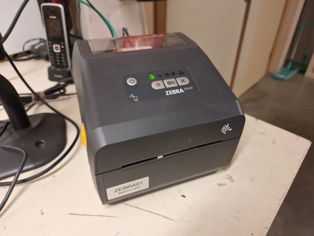 Lot met ASUS 14-inch Chromebook,Zebra Labelprinter,Handset en ...